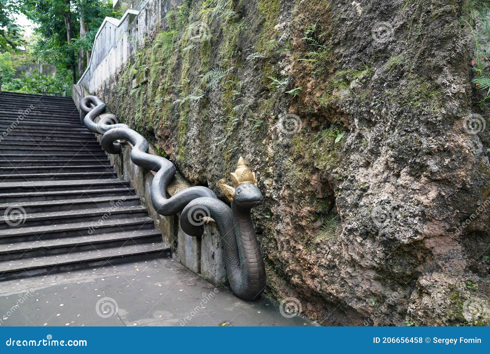 Steps in the Park with an Iron Snake on the Railing Stock Photo - Image ...