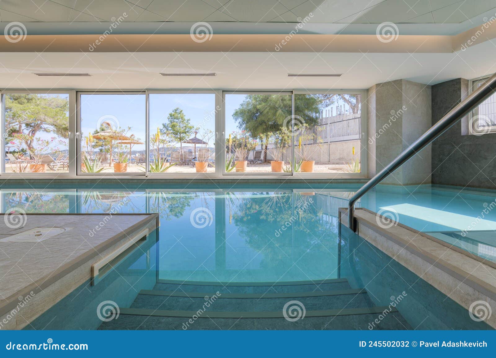 Steps and Railing Entrance in a Swimming Pool of a Hotel with Beach ...