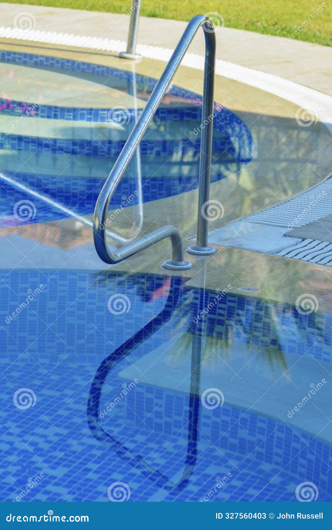 Steps in a swimming pool stock image. Image of reflections - 327560403