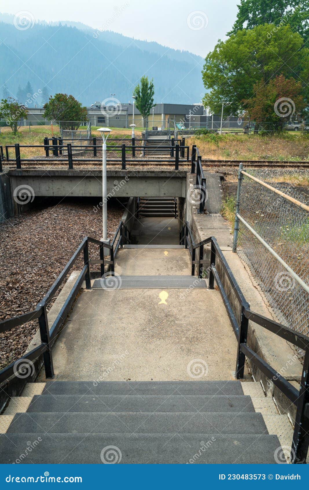 Steps on a Walkway Under a Railroad Bridge Stock Image - Image of ...