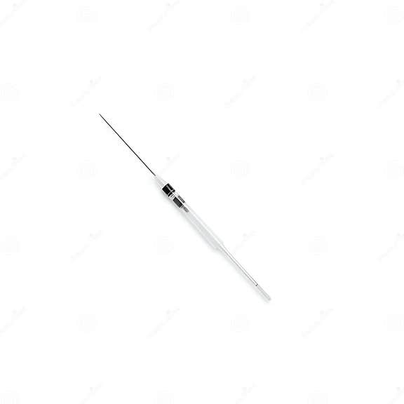 A Sterile Disposable Needle in Its Packaging Lying on a Plain White ...