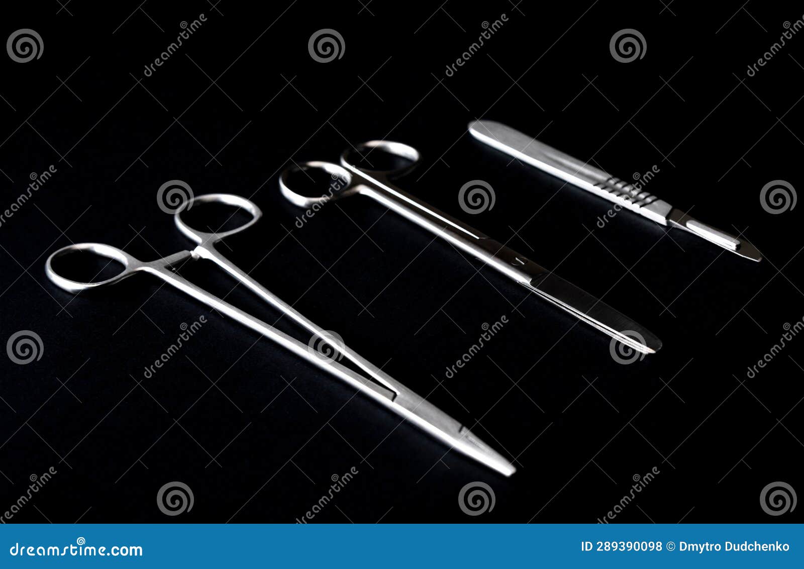 Sterile Instruments on a Black Background Close-up. Preparing ...