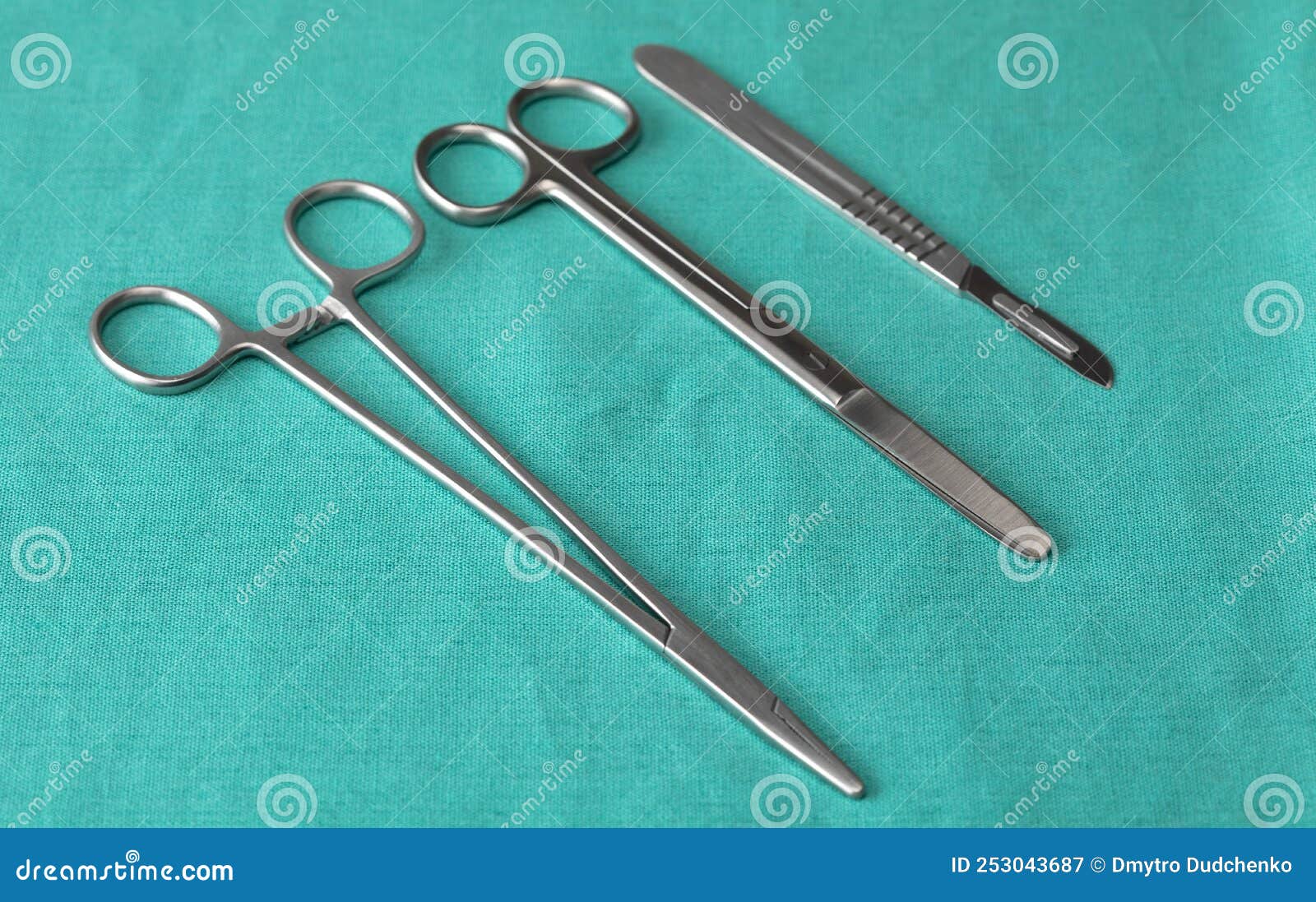 Sterile Instruments on a Green Background Close-up. Preparing ...