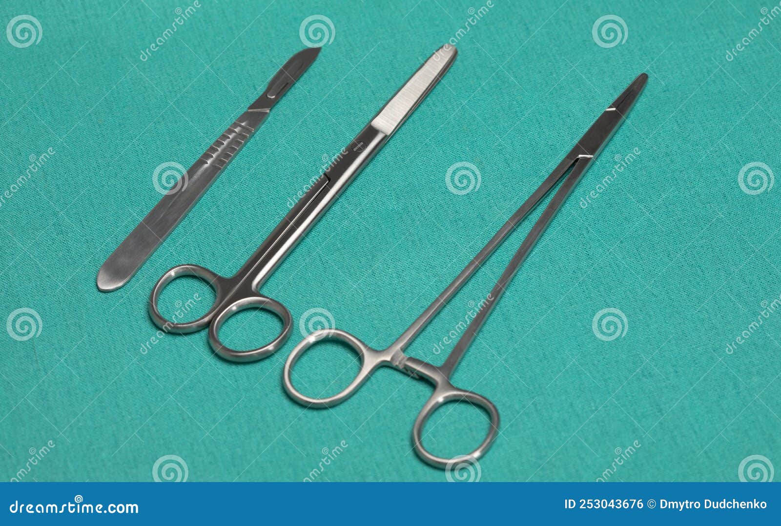 Sterile Instruments on a Green Background Close-up. Preparing ...