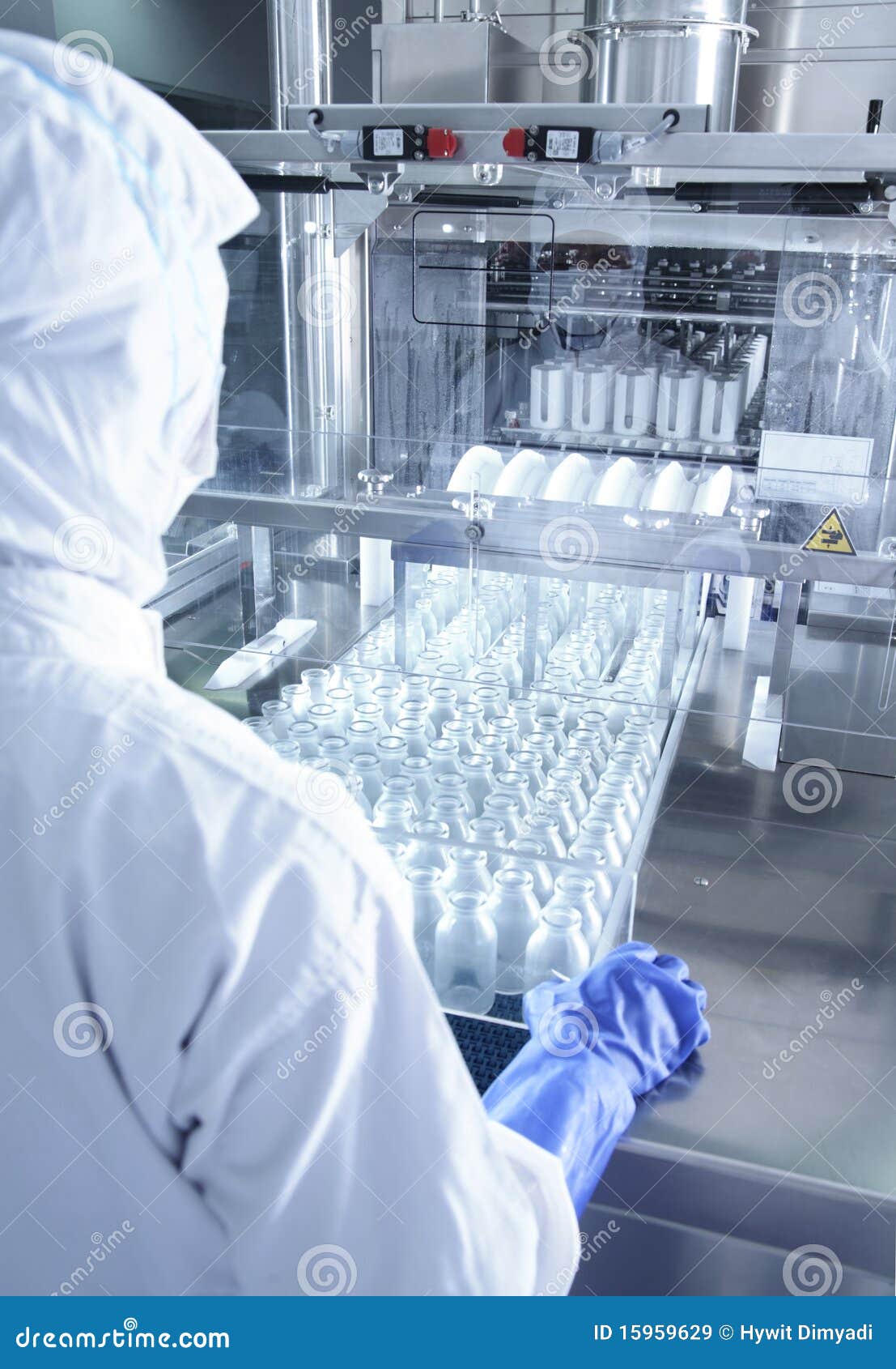 Sterile Machine with Operator Stock Image - Image of container, bottles ...