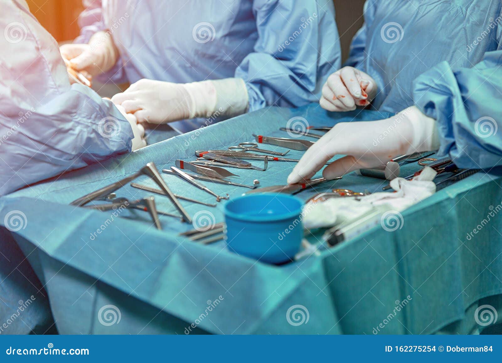A Sterile Operating Room Table with Instruments for Surgery Located on ...