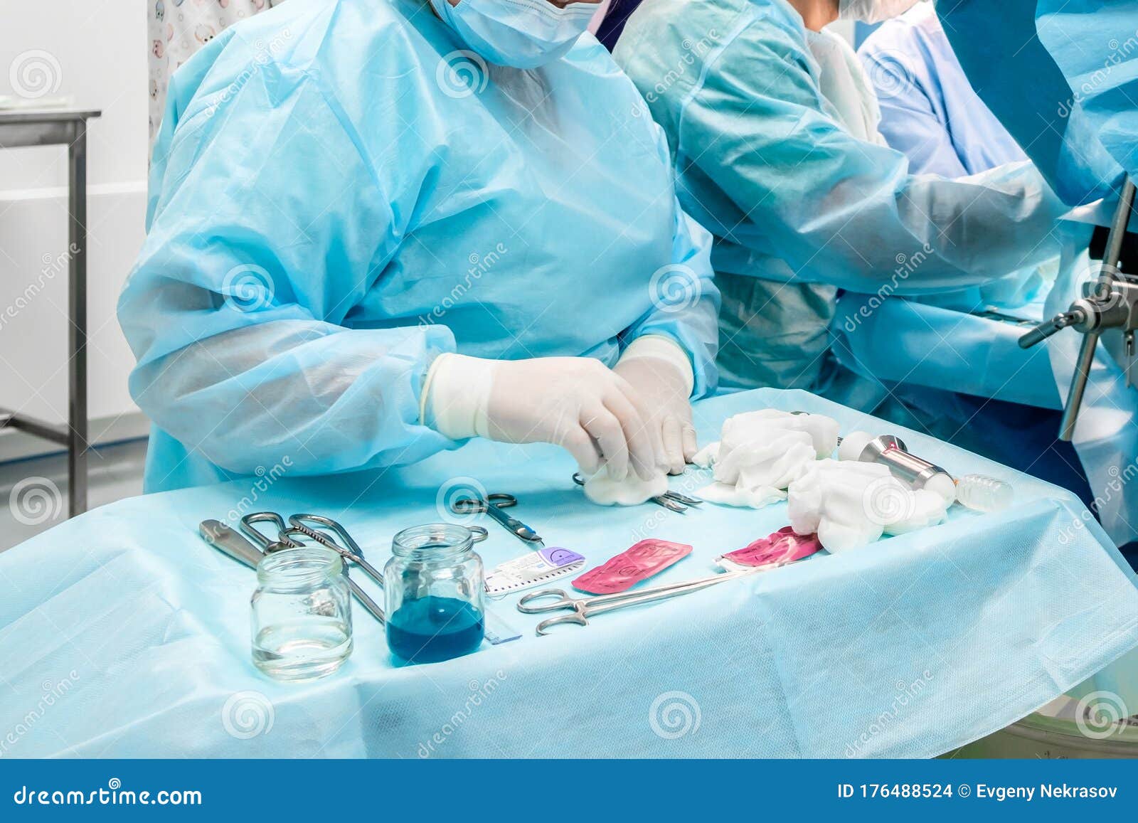 Sterile Surgical Instruments and Glass Containers with Solutions on the ...