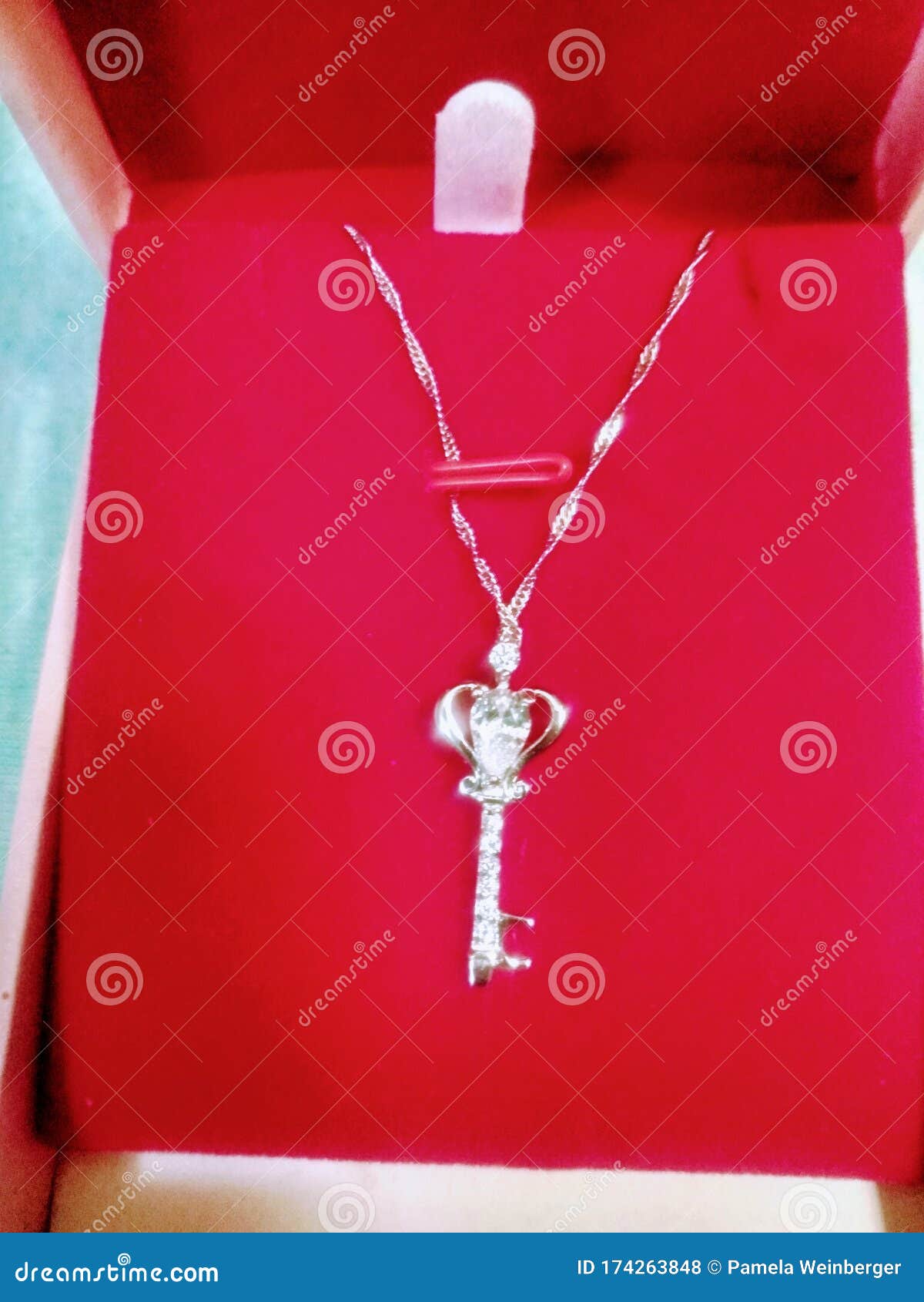 Sterling Silver Key Pendent with Authentic Diamond Necklace Stock Photo ...