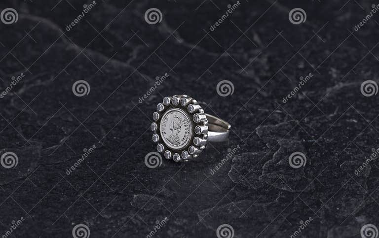 Sterling Silver Ring on Black Stone Background Stock Photo - Image of ...