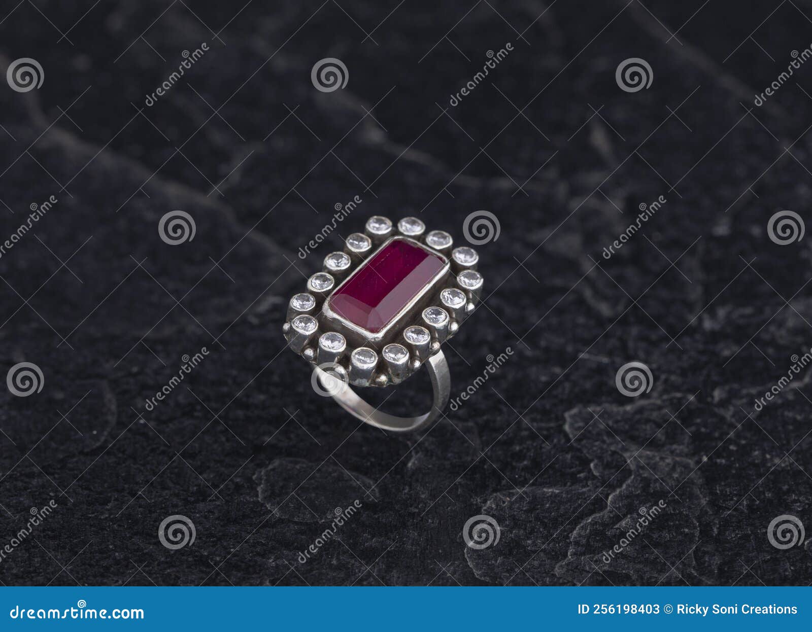 Sterling Silver Ring on Black Stone Background Stock Image - Image of ...