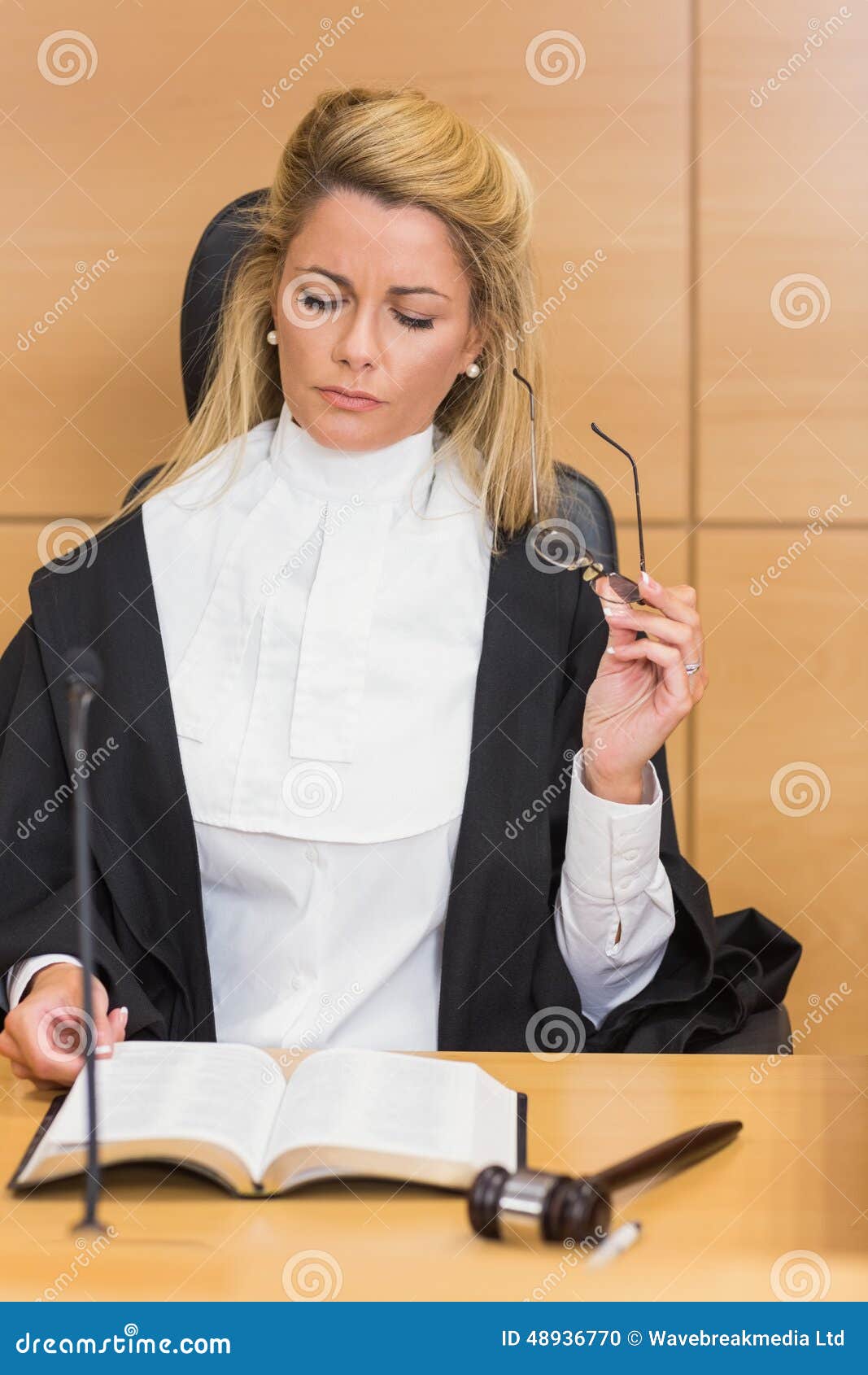 Stern Judge Reading Her Notes Stock Photo - Image of trial, serious ...