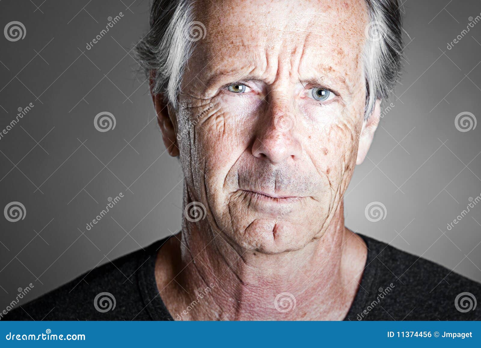 Stern Looking Senior Man stock photo. Image of active - 11374456