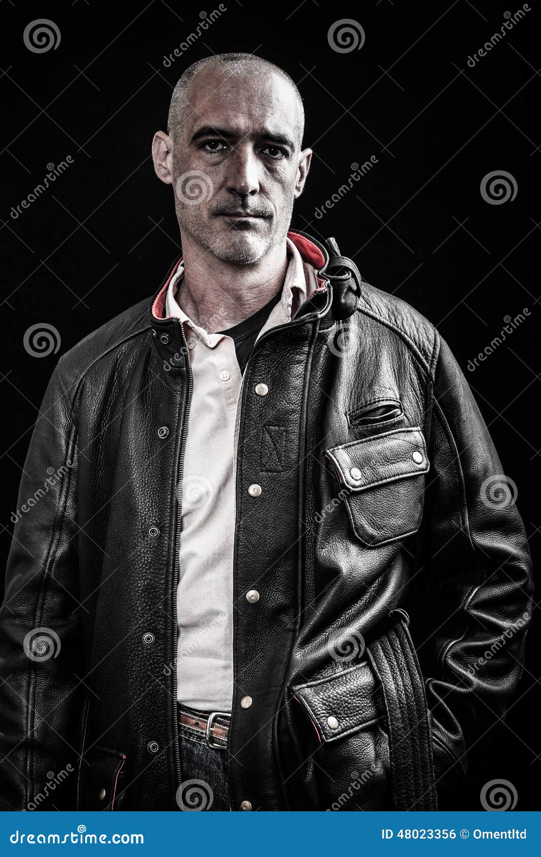 Stern Man in Leather stock photo. Image of black, drinking - 48023356