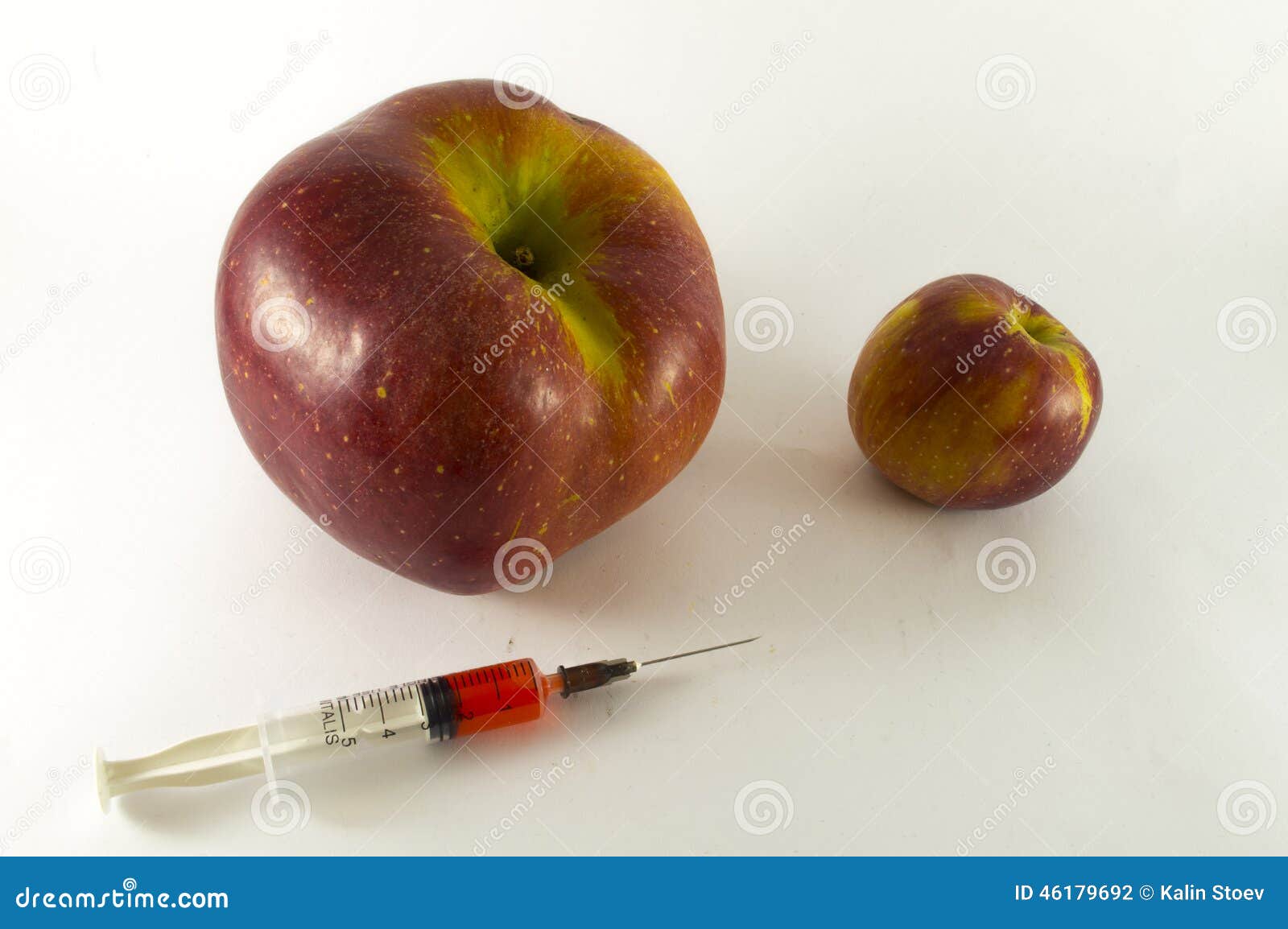 Steroid needle with apples stock photo. Image of drug - 46179692