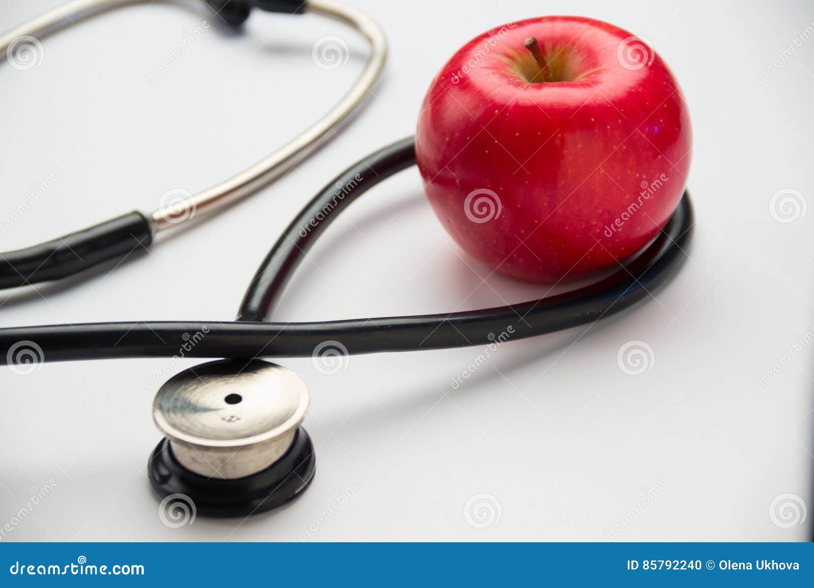 Stethoscope and an Apple on Table Stock Photo - Image of health ...