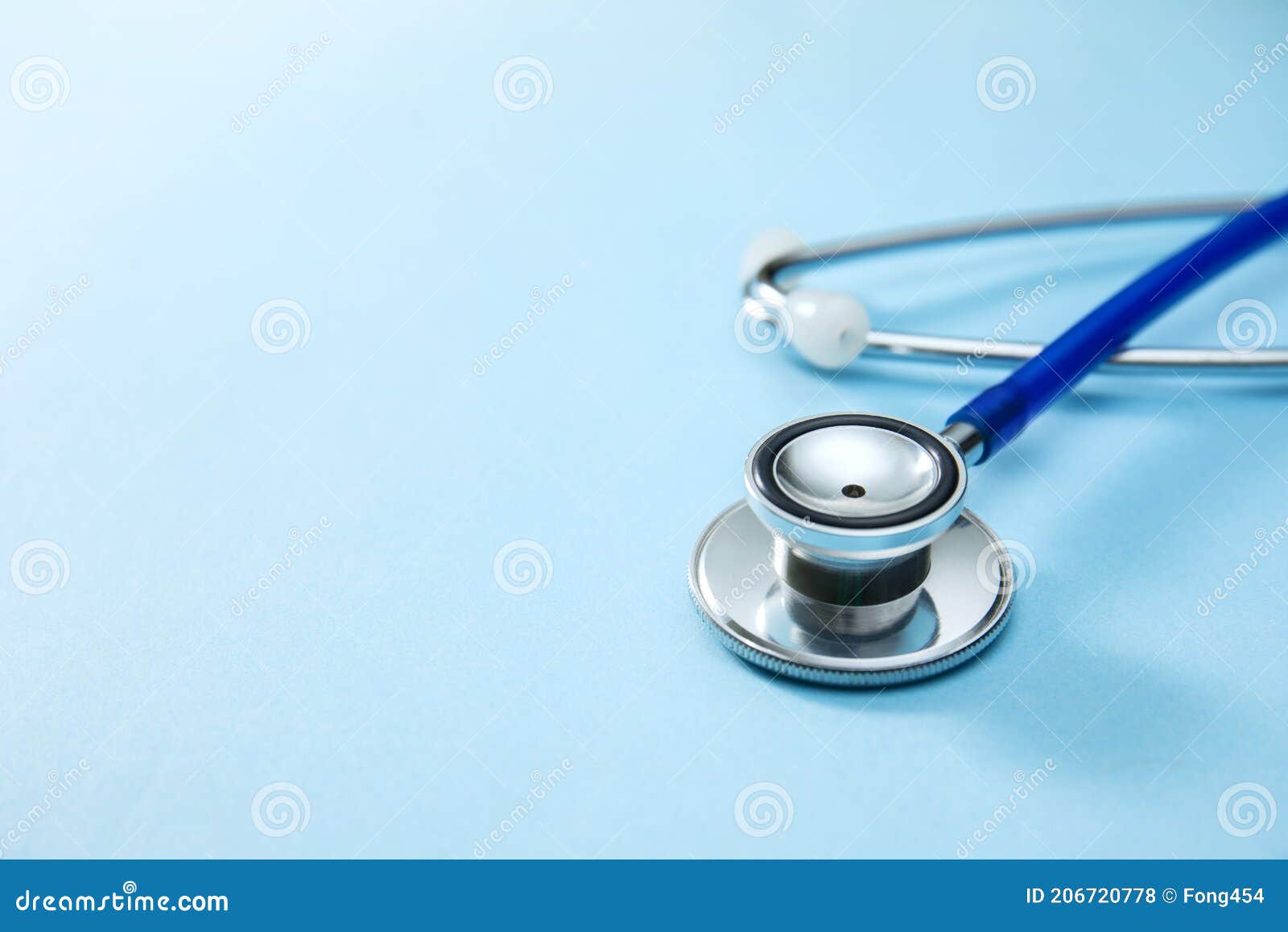 Stethoscope on Blue Background with Empty Space for Text and Title ...
