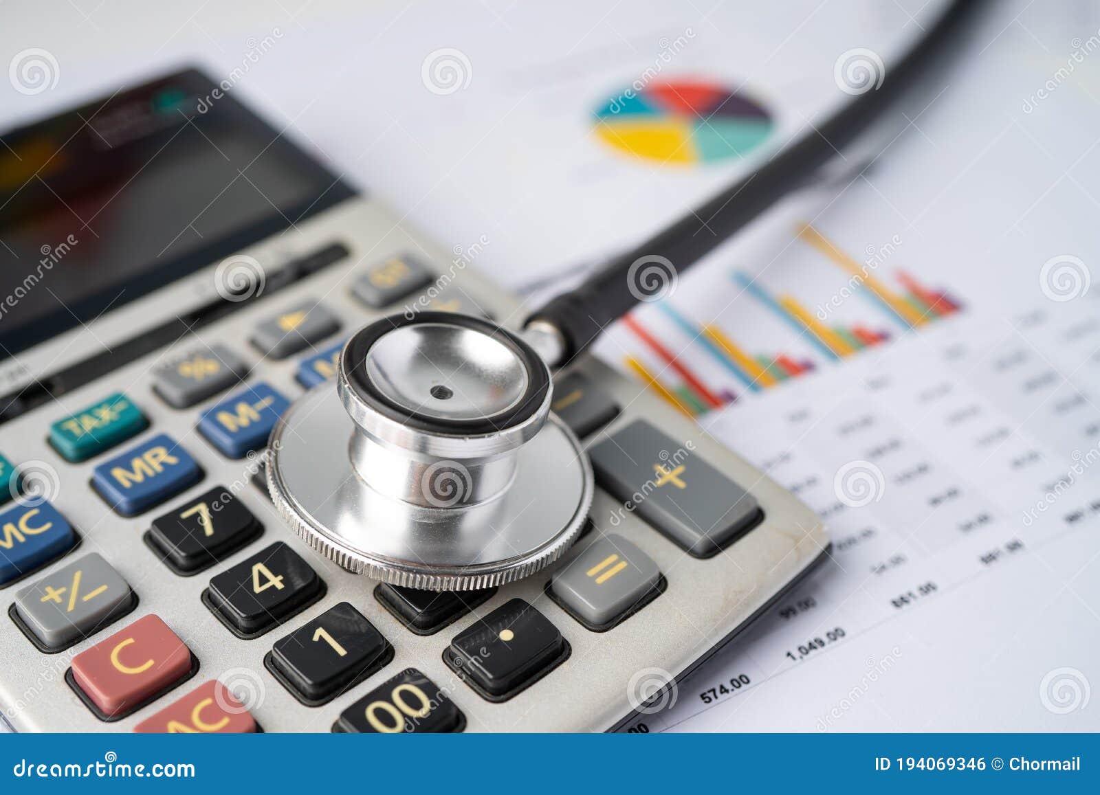 Stethoscope with Calculator on Chart Graph Paper, Finance, Account ... Stethoscope with Calculator on Chart Graph Paper, Finance, Account ...