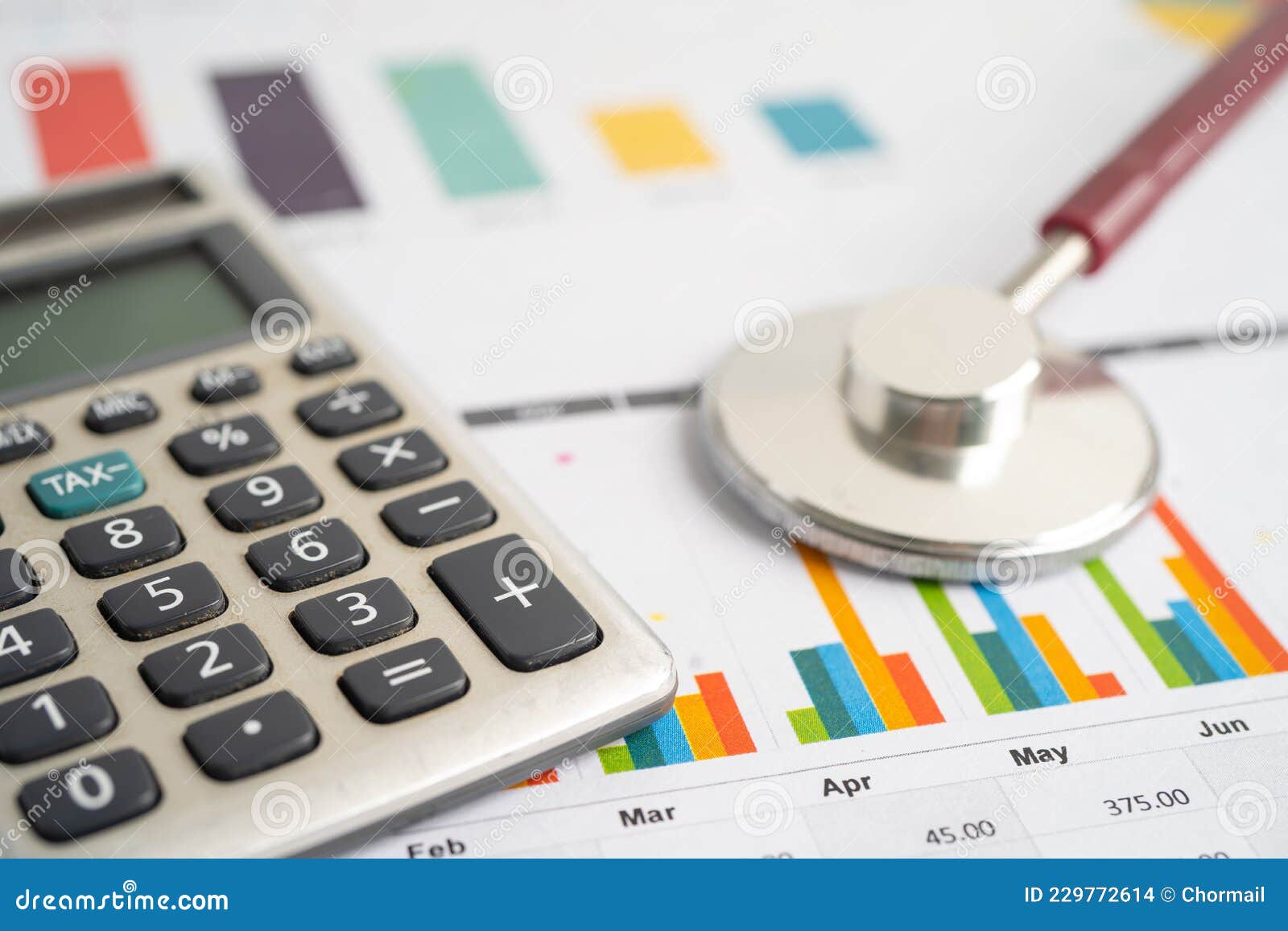 Stethoscope with Calculator on Chart Graph Paper, Finance, Account ... Stethoscope with Calculator on Chart Graph Paper, Finance, Account ...