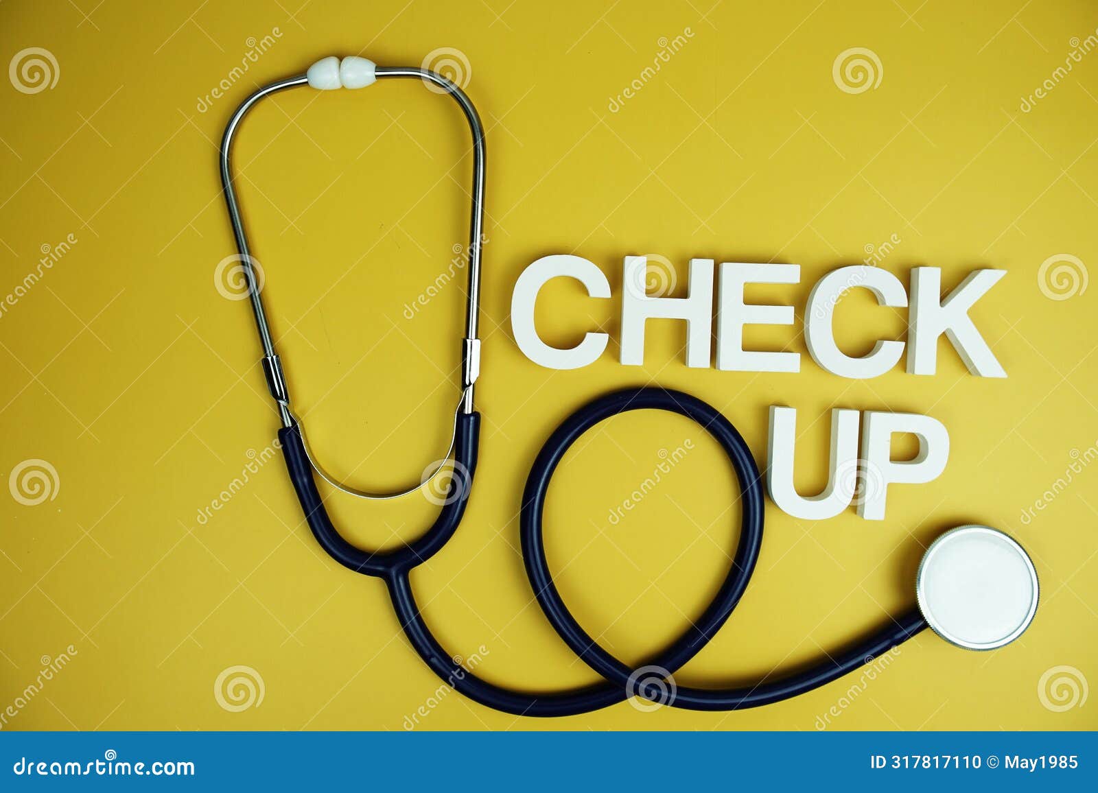 Stethoscope and Check Up Alphabet Letters Top View on Yellow Background ...