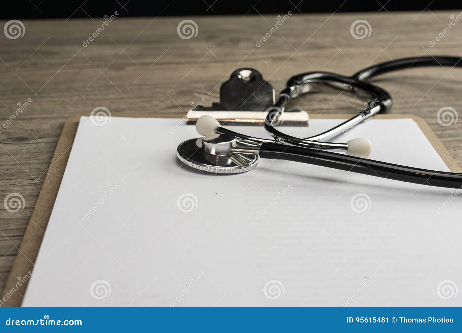 Stethoscope on clip pad stock image. Image of medicine - 95615481