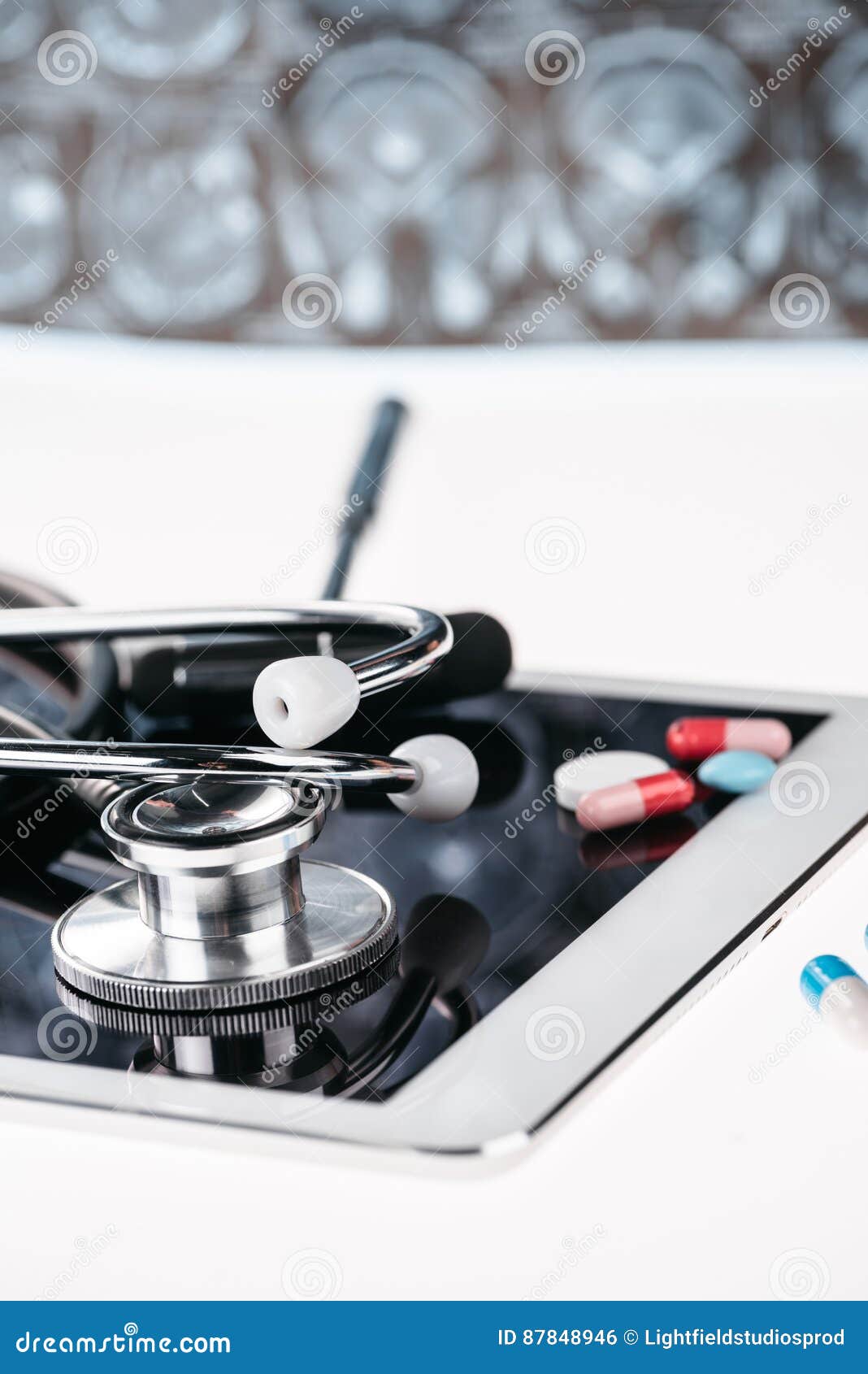 Stethoscope on Digital Tablet and Pills on White Stock Photo - Image of ...