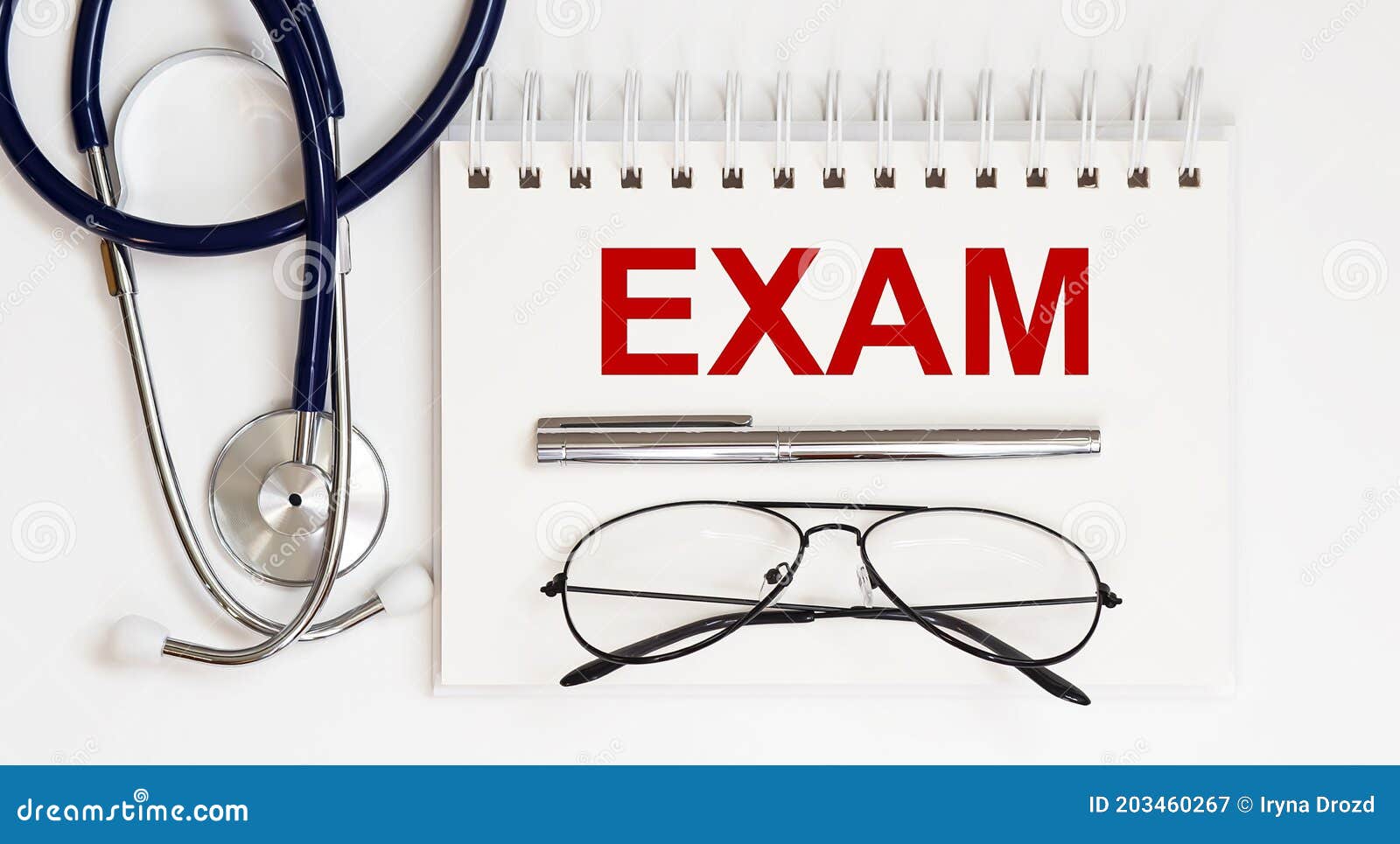 Stethoscope,glasses and Pen with Notepad with Text EXAM Stock Image ...