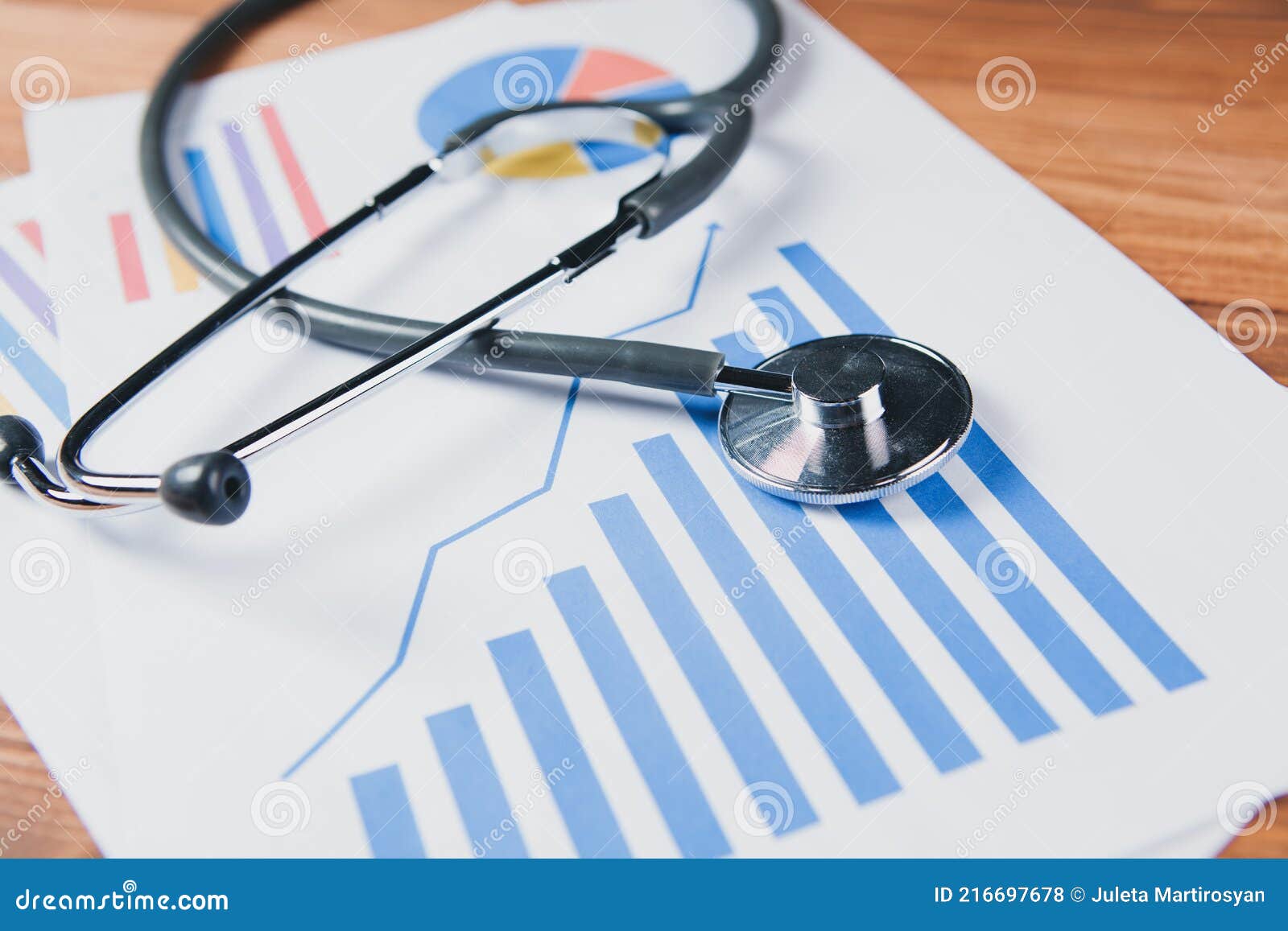 Stethoscope on a Graphic Charts Stock Photo - Image of management, care ...