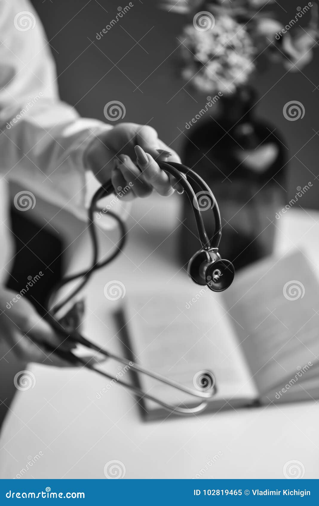 A stethoscope in the hands stock image. Image of instrument - 102819465