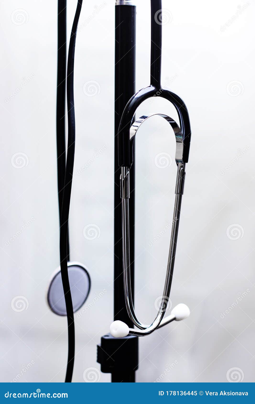 Stethoscope Hanging on a Black Stand on a White Background Stock Image ...