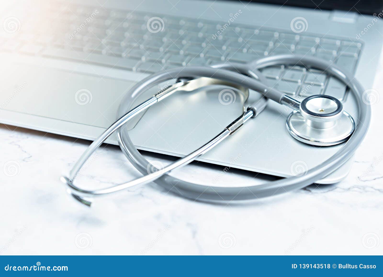 Stethoscope on Laptop on Table. Object for Doctor and Technology Stock ...