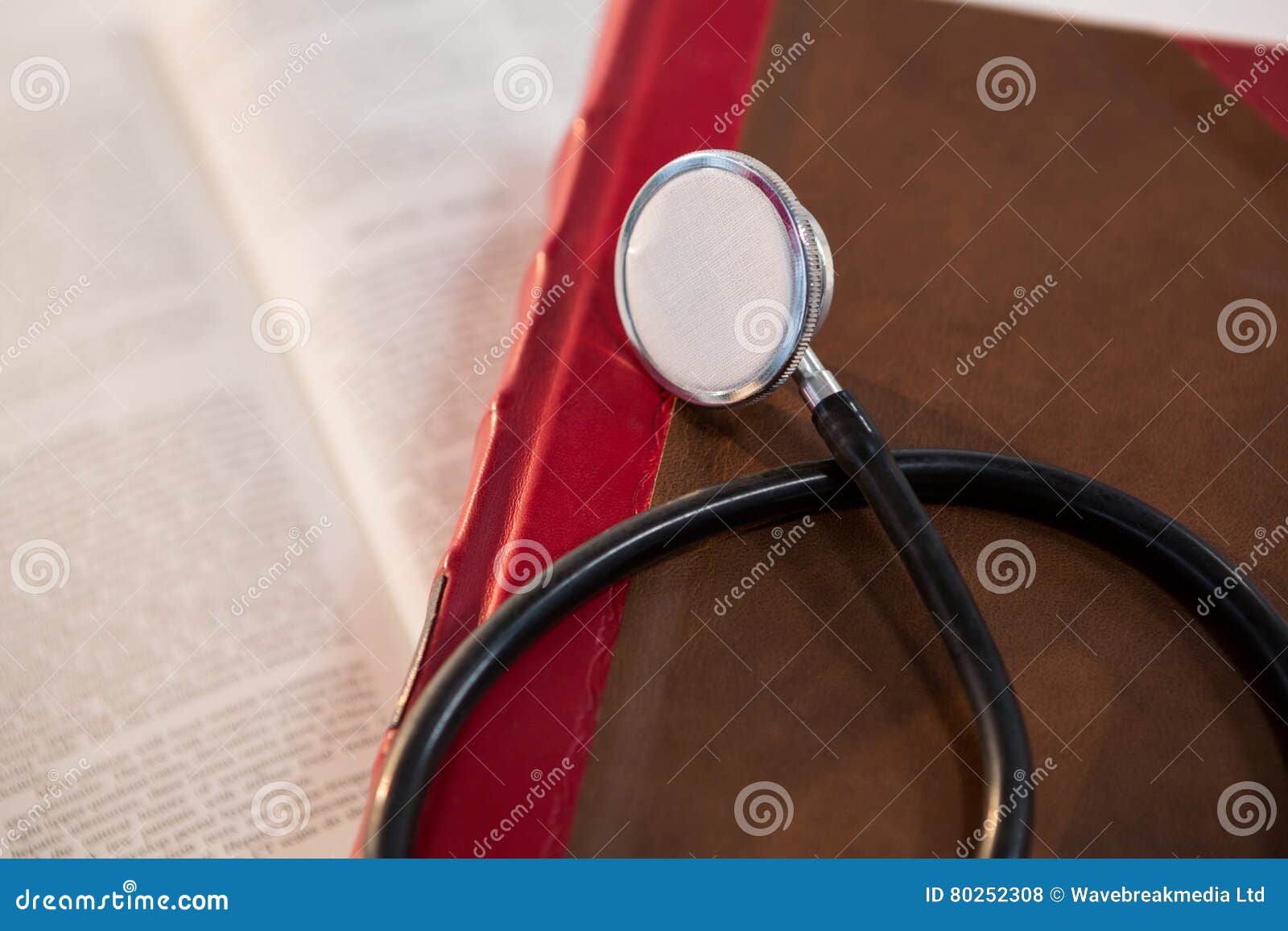 Stethoscope on open book stock photo. Image of medical - 80252308