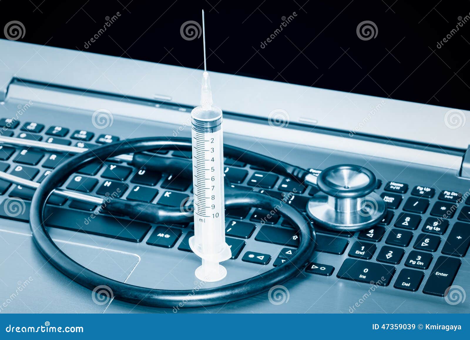 Stethoscope and Syringe on a Computer Keyboard Stock Image - Image of ...