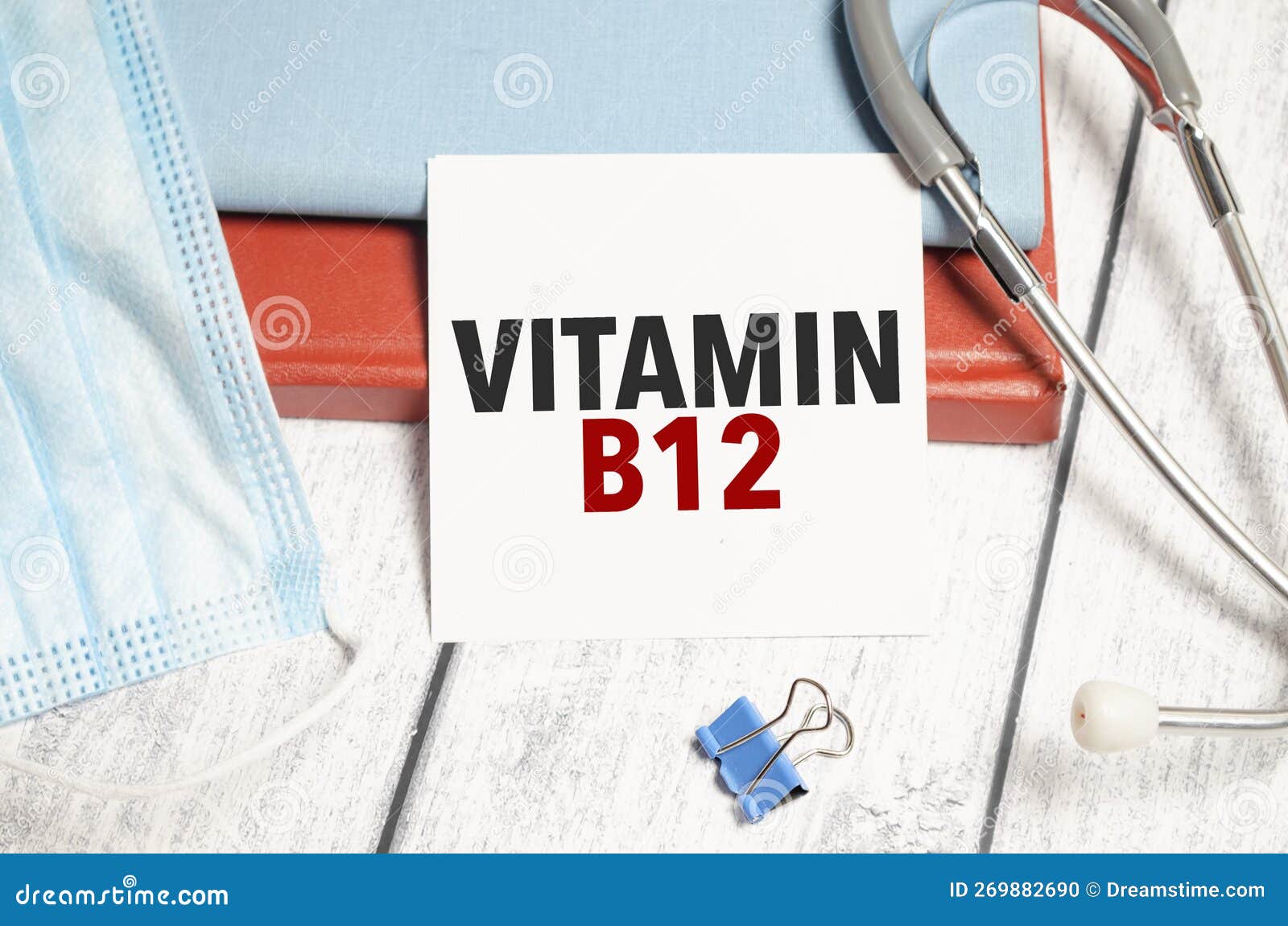 Stethoscope and White Card with Vitamin B12 Text on Notebook Stock Photo - Image of care ...
