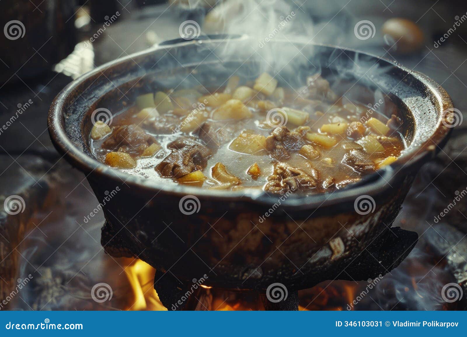 Stew Being Cooked Over an Open Flame Outdoors, Possibly for Camping or ...