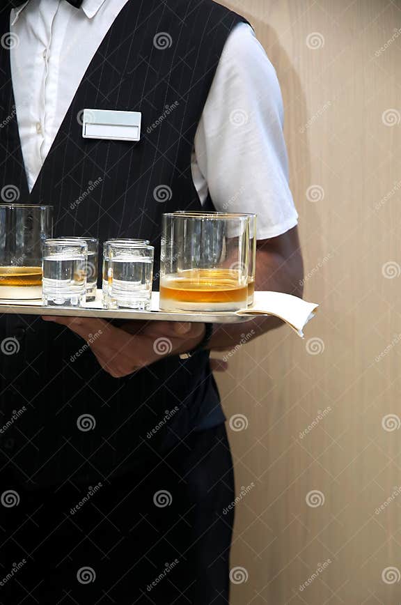 Steward in hotel stock image. Image of glass, wait, drinks - 1206005