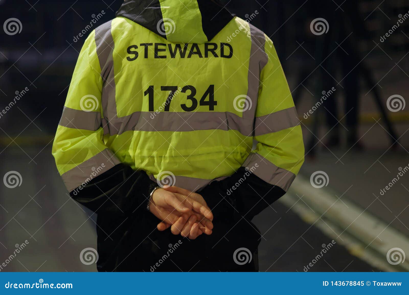 Steward works at an event stock image. Image of supporters - 143678845