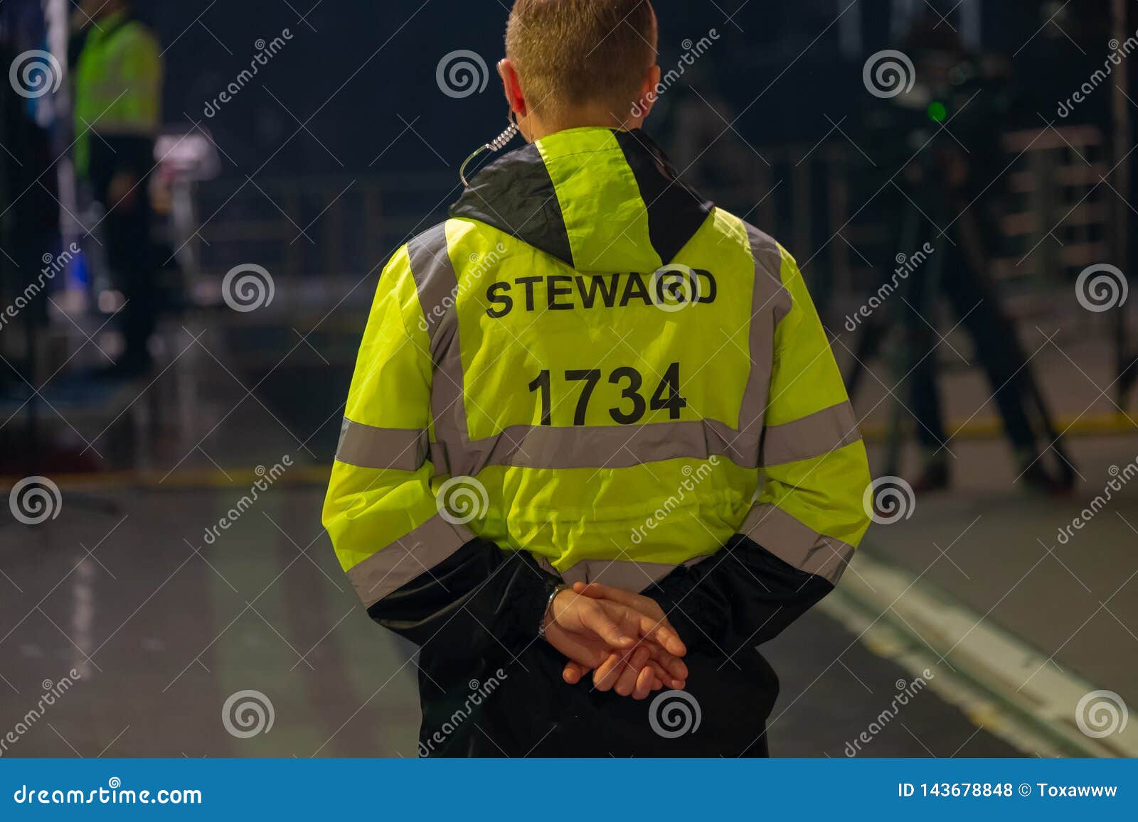 Steward works at an event editorial stock photo. Image of stewards ...