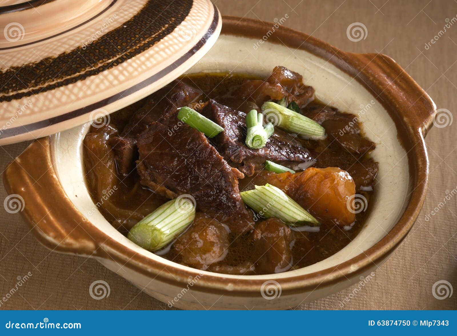 Stewed Assorted Meats and Seafood Stock Photo - Image of stewed, sauce ...
