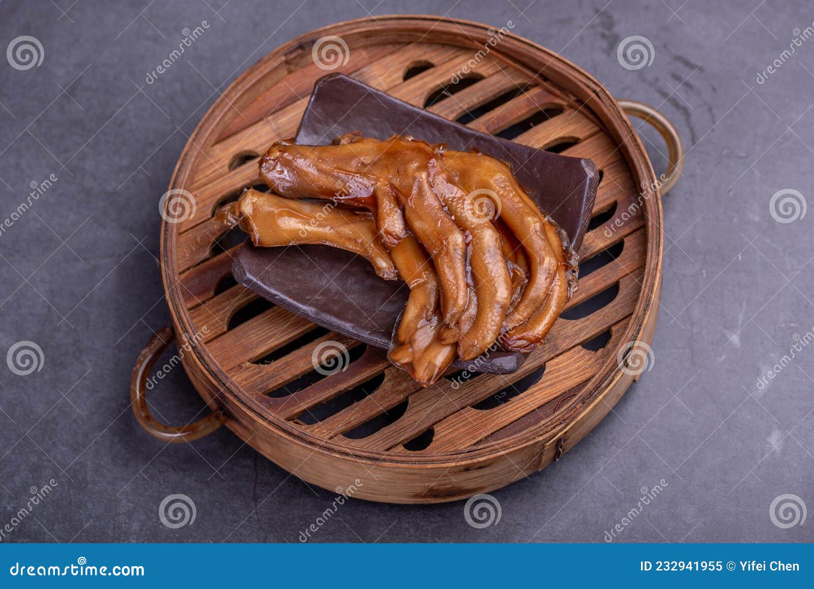 The Stewed Duck Claws in the Container are in a Dark Background Stock ...