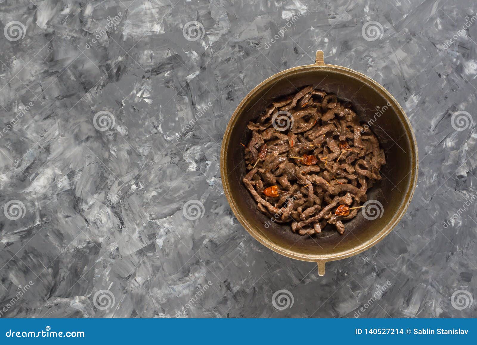 Stewed Meat Cut into Thin Strips in a Cauldron. Stock Photo - Image of ...