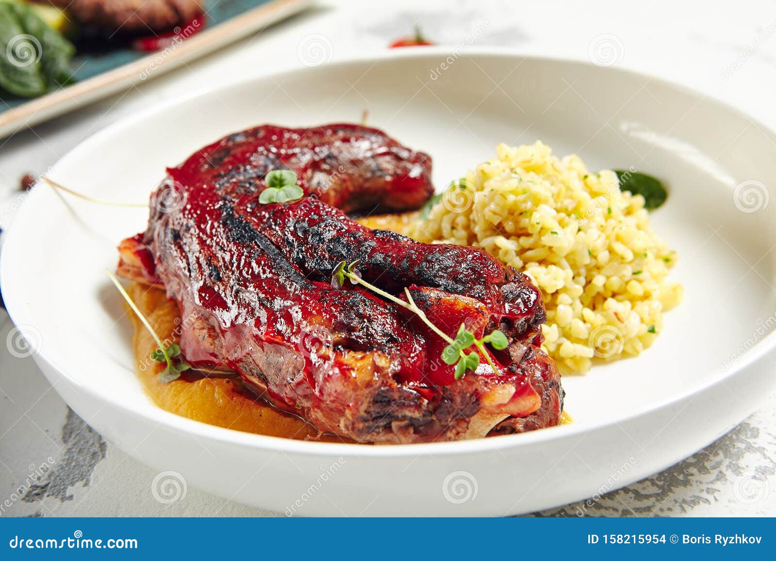 Stewed Oxtail with Bulgur stock photo. Image of cutting - 158215954