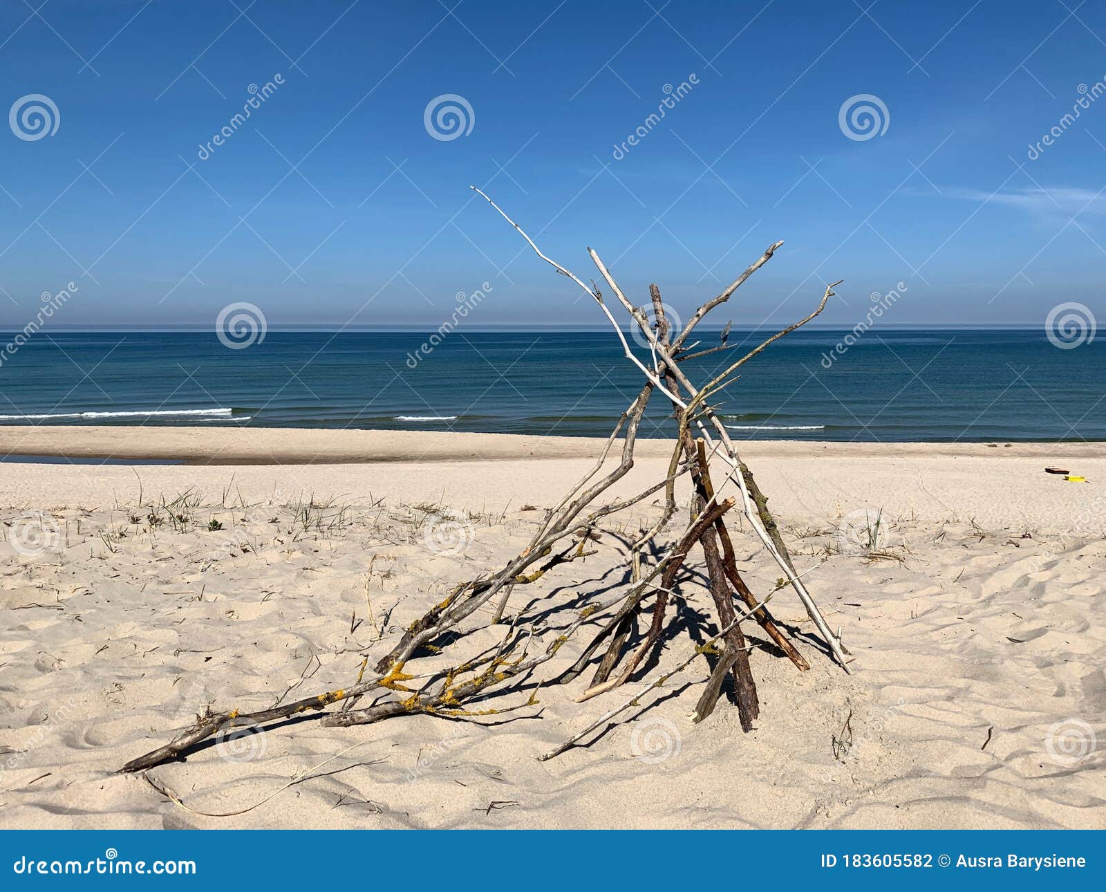 Stick Construction on Beach Sand, Land Art on the Sea Coast Stock Photo ...