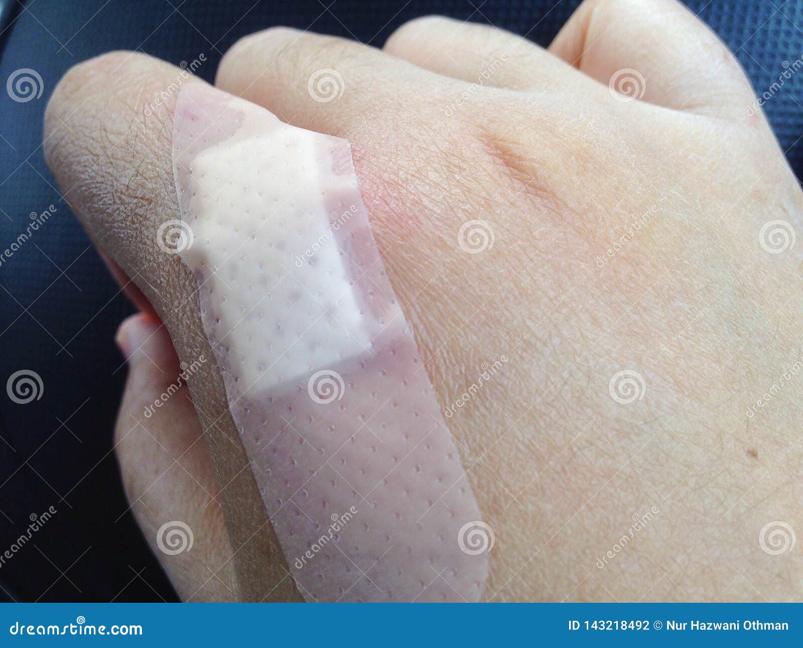 Stick a Plaster on Wound Hand Stock Photo - Image of waterproof, hand ...