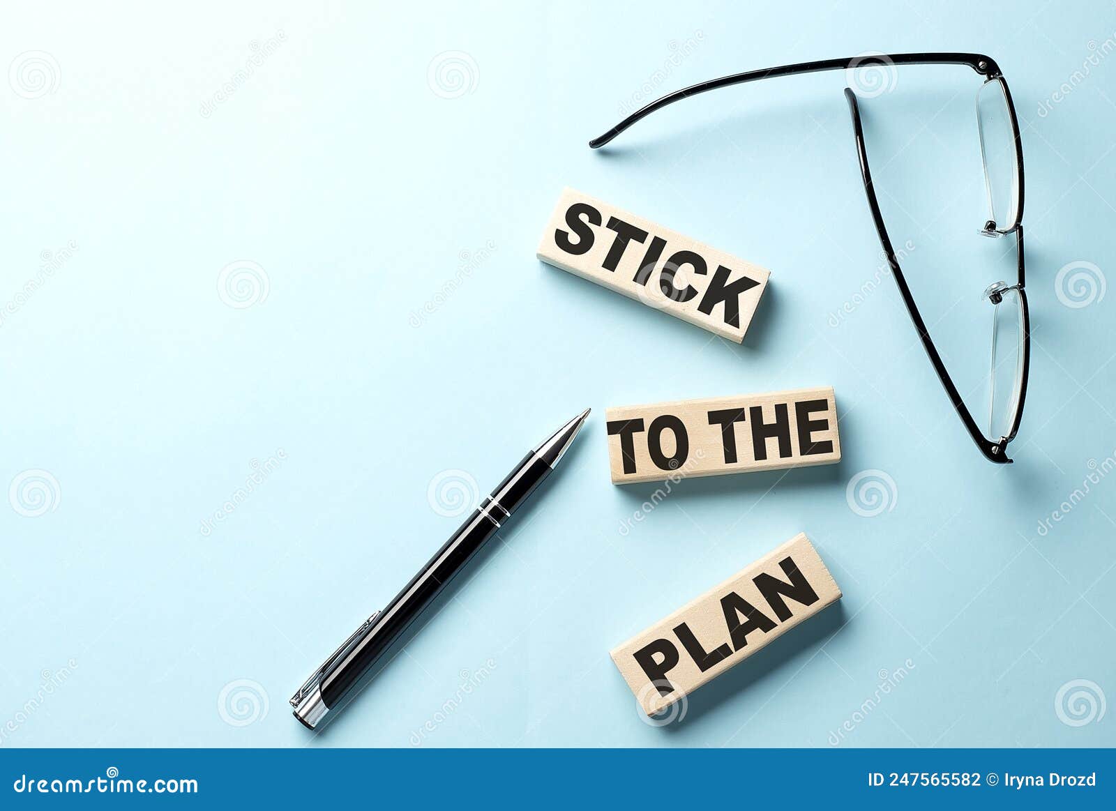 STICK TO the PLAN Text on a Wooden Block ,blue Background Stock Photo ...