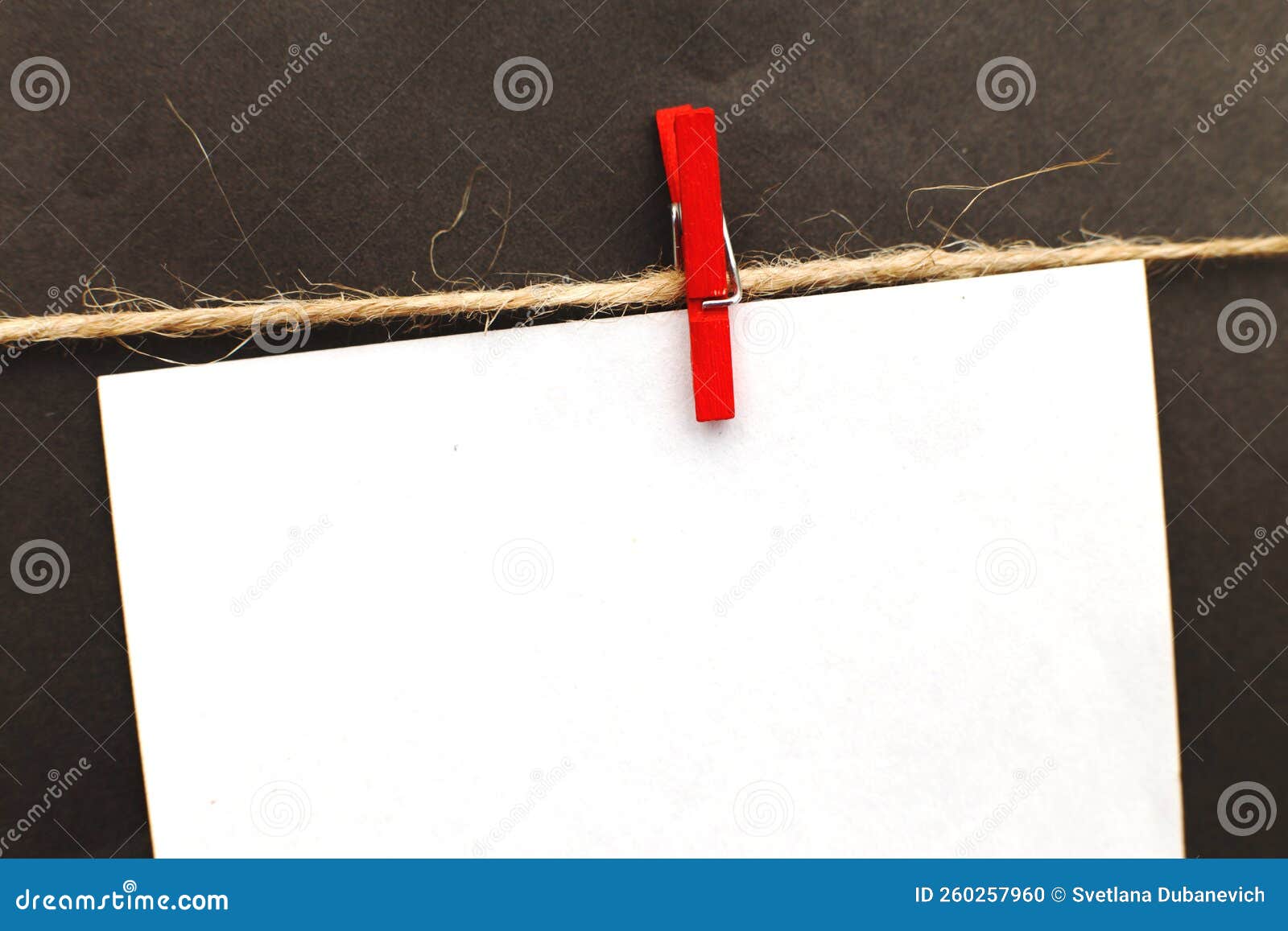 Sticker with Empty Mockup for Text Hanging on a Pin on Black Background ...