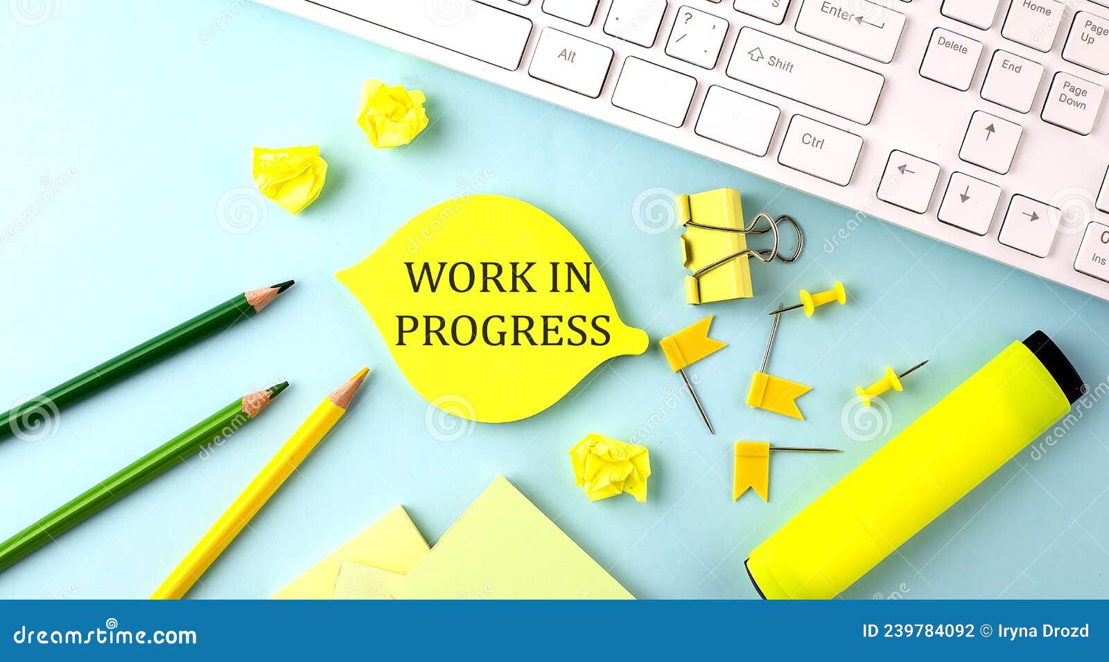 Sticker with WORK in PROGRESS Text on Notebooks on White Background ...