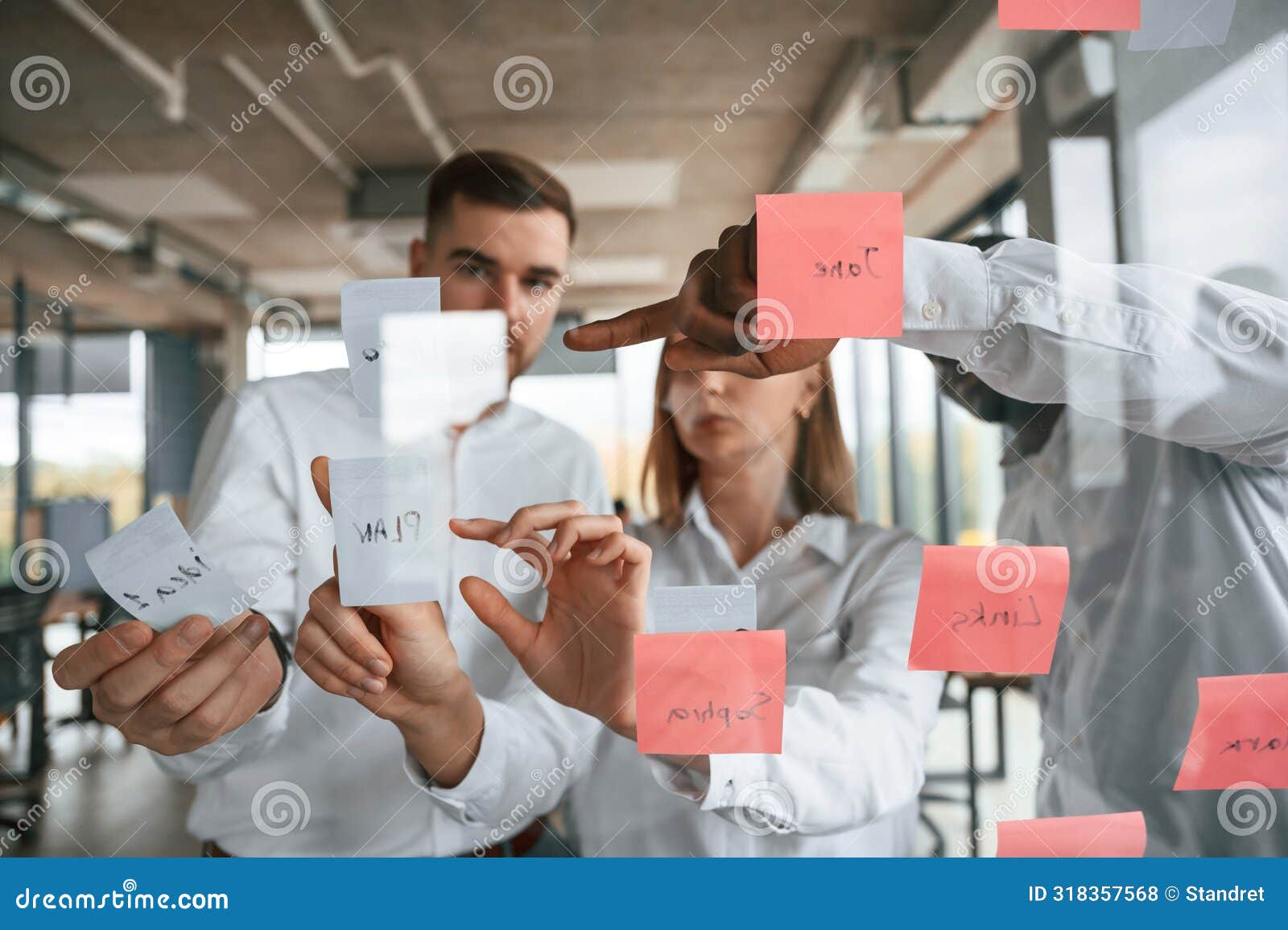 Stickers on the Glass, Planning the Project. Group of Office Workers ...