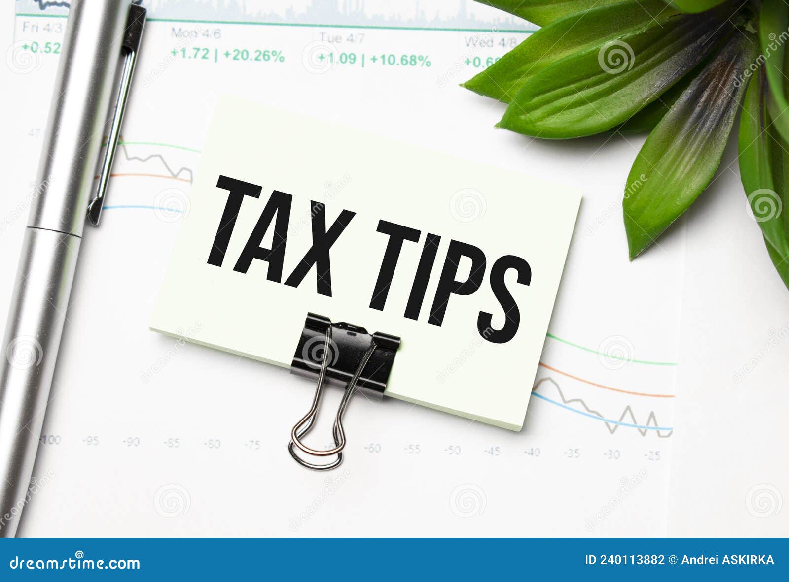 Stickers on Notebook Text TAX TIPS with Pen and Glasses on the White ...