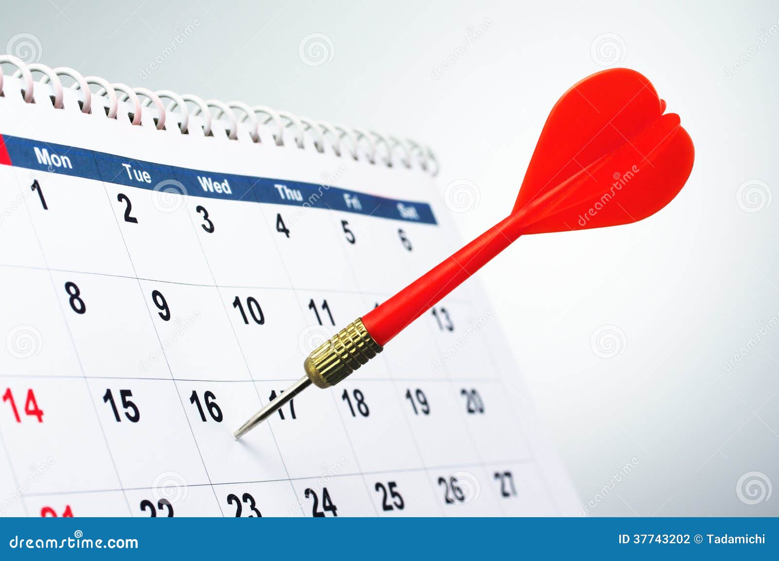 Sticking Arrow into Calendar. Stock Photo - Image of today, calendar ...