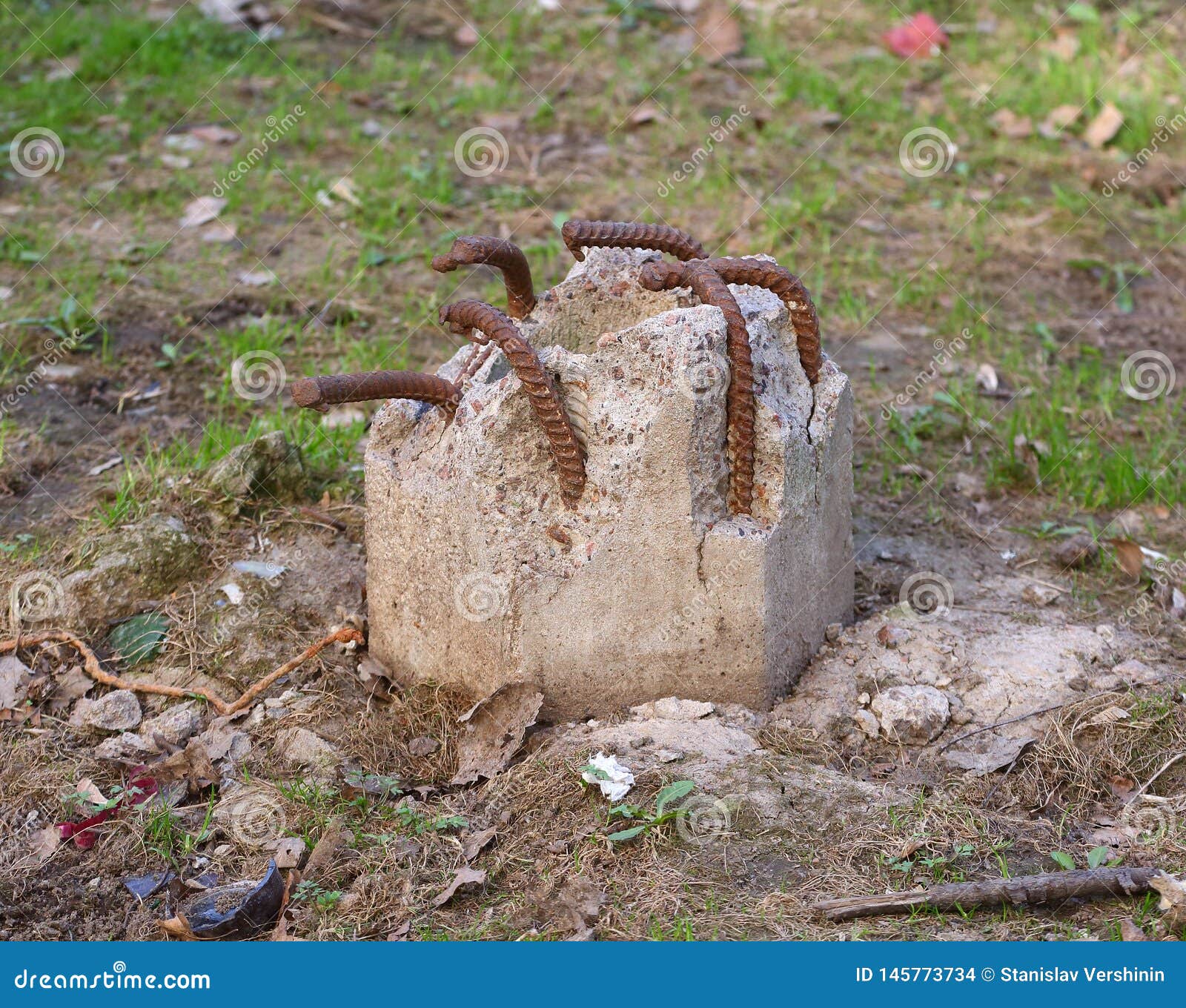 Sticking Out of the Ground a Piece of a Concrete Pillar Stock Photo ...